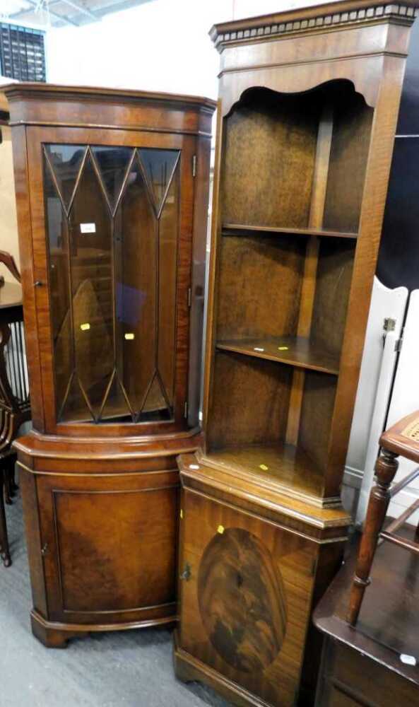 A walnut veneered corner unit, bow fronted glazed door, on a single bow ...