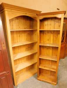 A pine open bookcase, 190cm high, 95cm wide, 32cm deep, and another. (2 ...