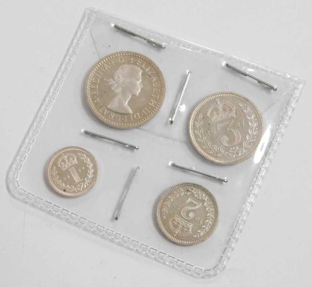 - A 1977 Maundy money set and Westminster Abbey programme.
