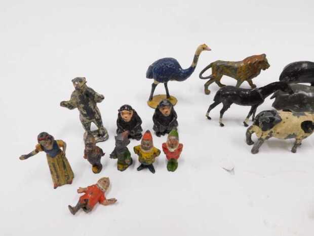 A collection of painted lead animals, to include ostrich, rhino, lion ...