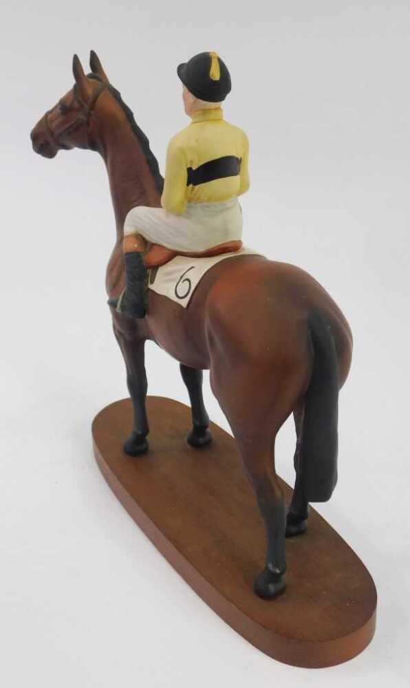 - A Beswick matt porcelain figure, modelled as Arkle with jockey Pat ...