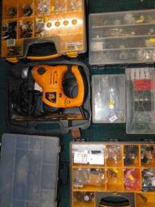 A cased JCB electric power chisel, in case, together with various ...