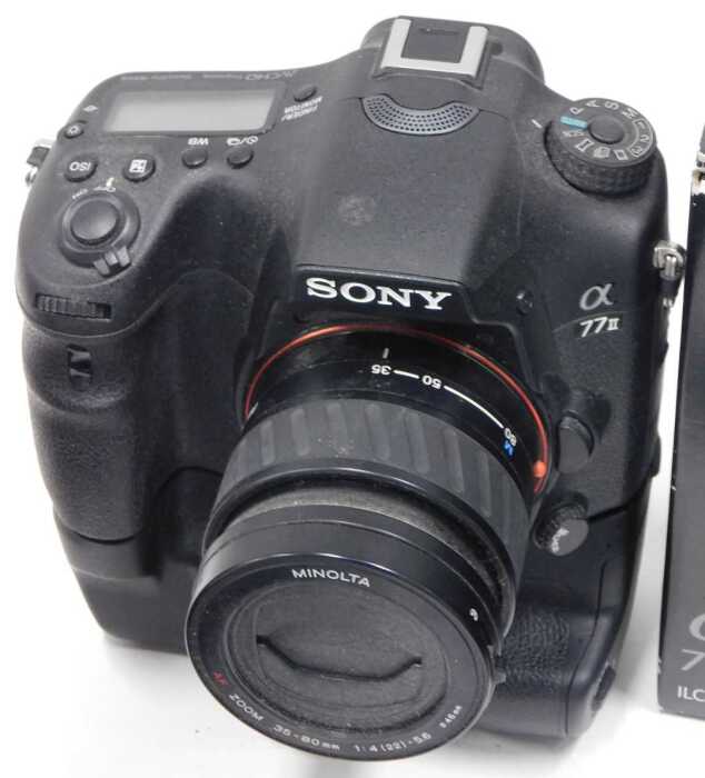 A Sony A77ii digital camera, with four batteries and vertical grip ...